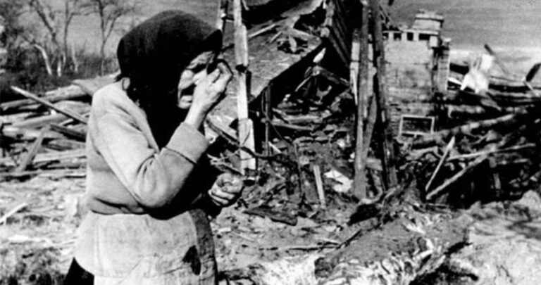 Russian old lady crying during the siege of Leningrad - WW2 HistoryBook
