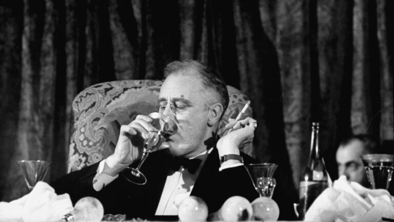 President Roosevelt smoking and drinking during a fundraiser in 1938 ...