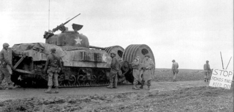 Anti mine rollers attached to the front of a US Sherman M4 tank - WW2 ...