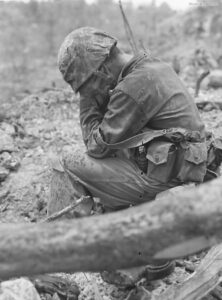 US Marine crying during the Battle of Peleliu - WW2 HistoryBook